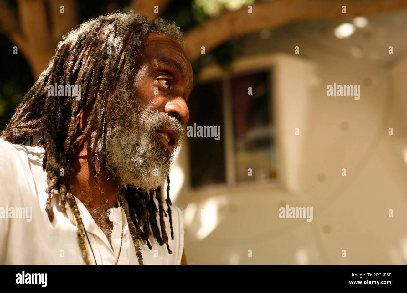 Ted Hayes, founder of the Dome Village, outside one of the dome ...