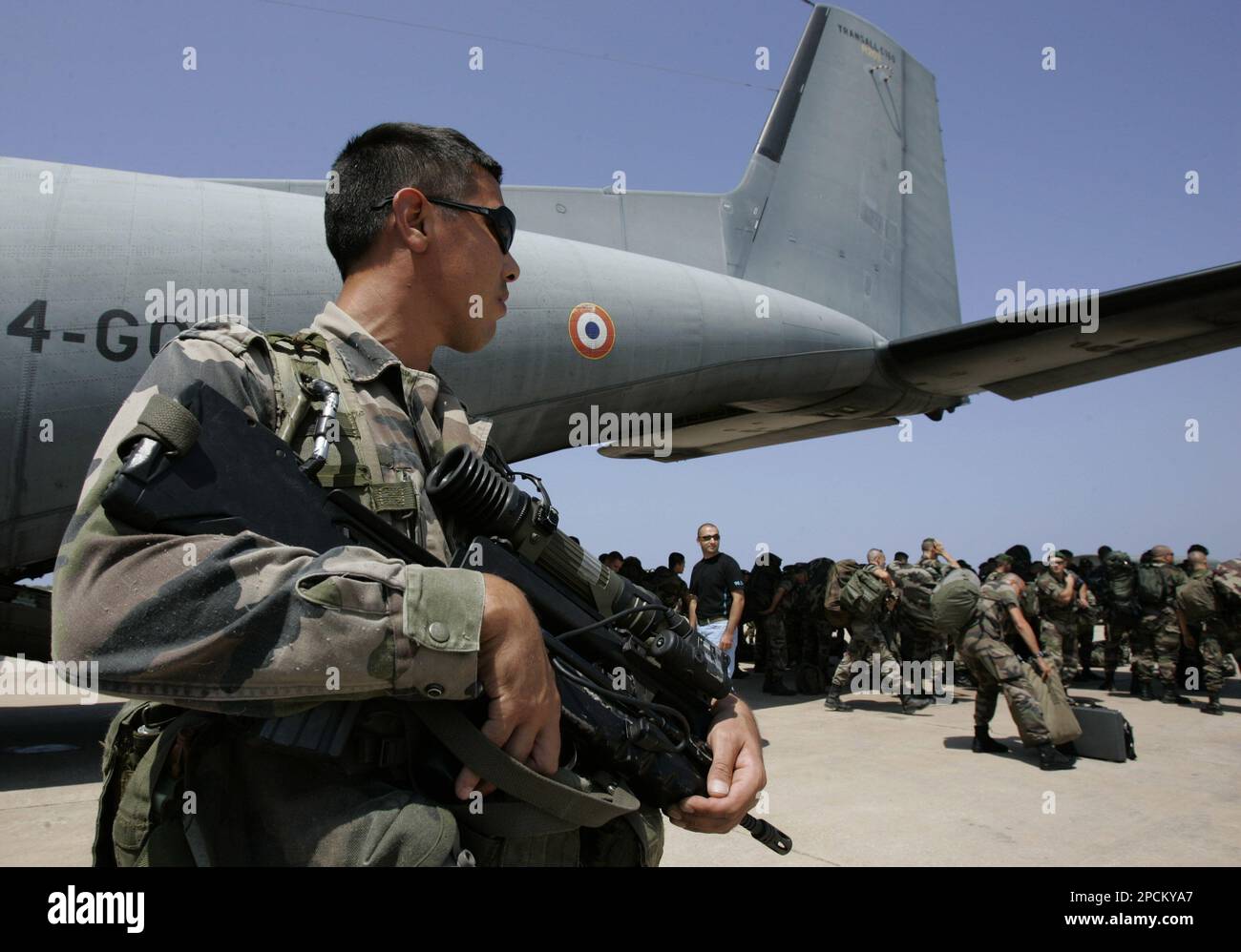 A French soldier stands guard as French soldiers from the Second ...