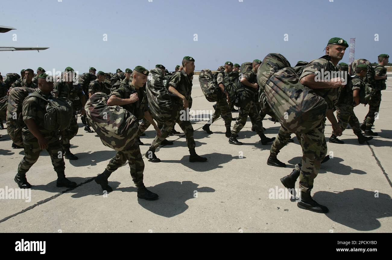 French soldiers from the Second Regiment of the Legion of Jenie, walk ...
