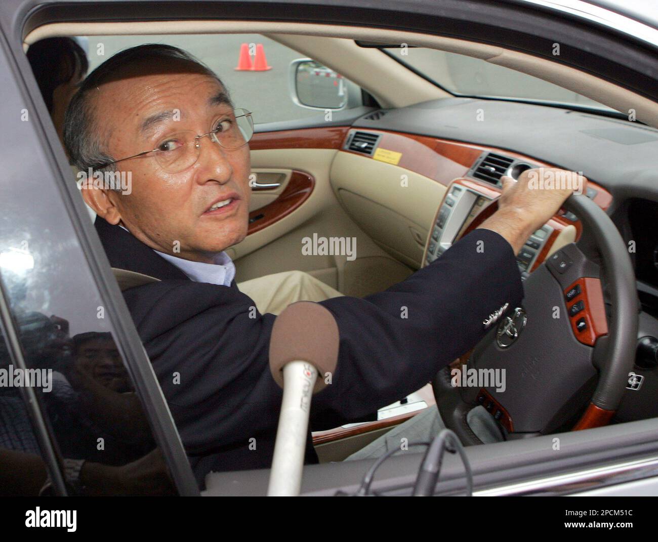 Toyota Motor Corp. President Katsuaki Watanabe speaks to a reporter ...