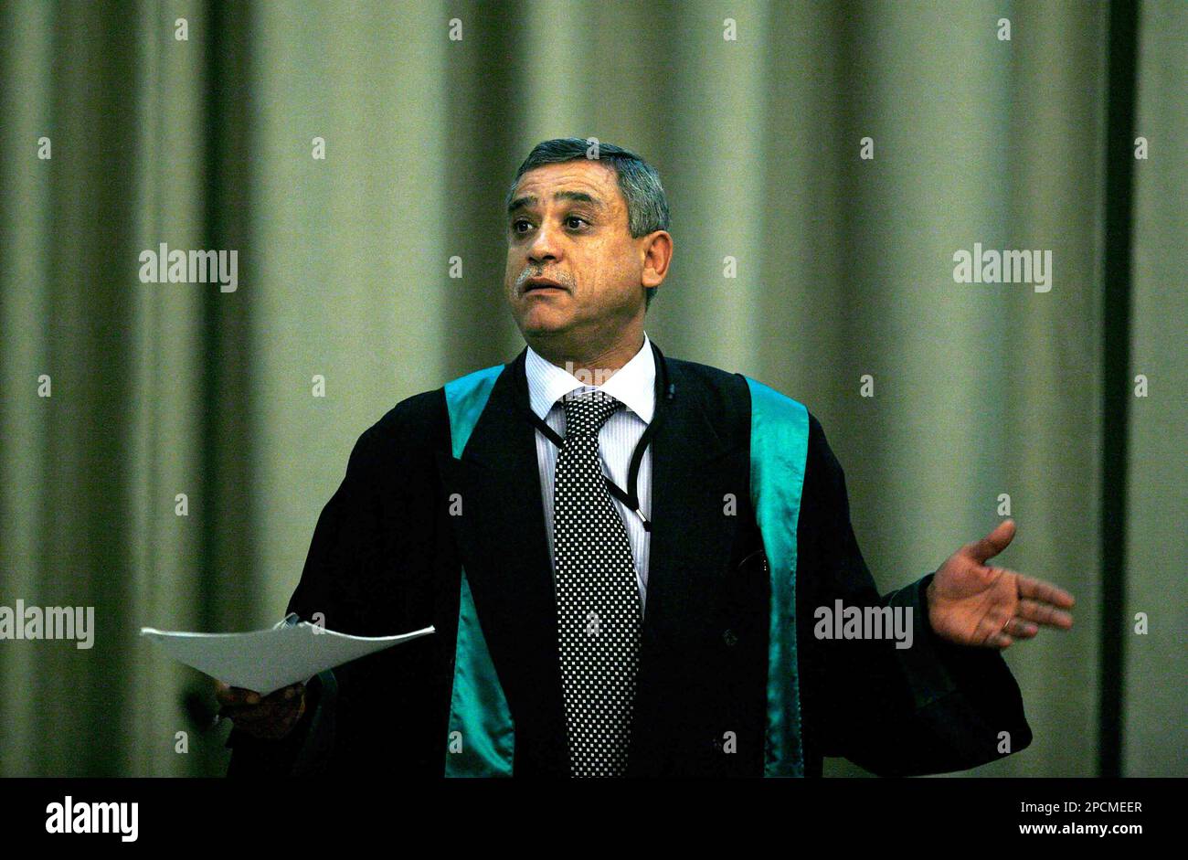 Defence attorney for Saddam Hussein, Ziad al-Najdawi address the court during the first day of ...
