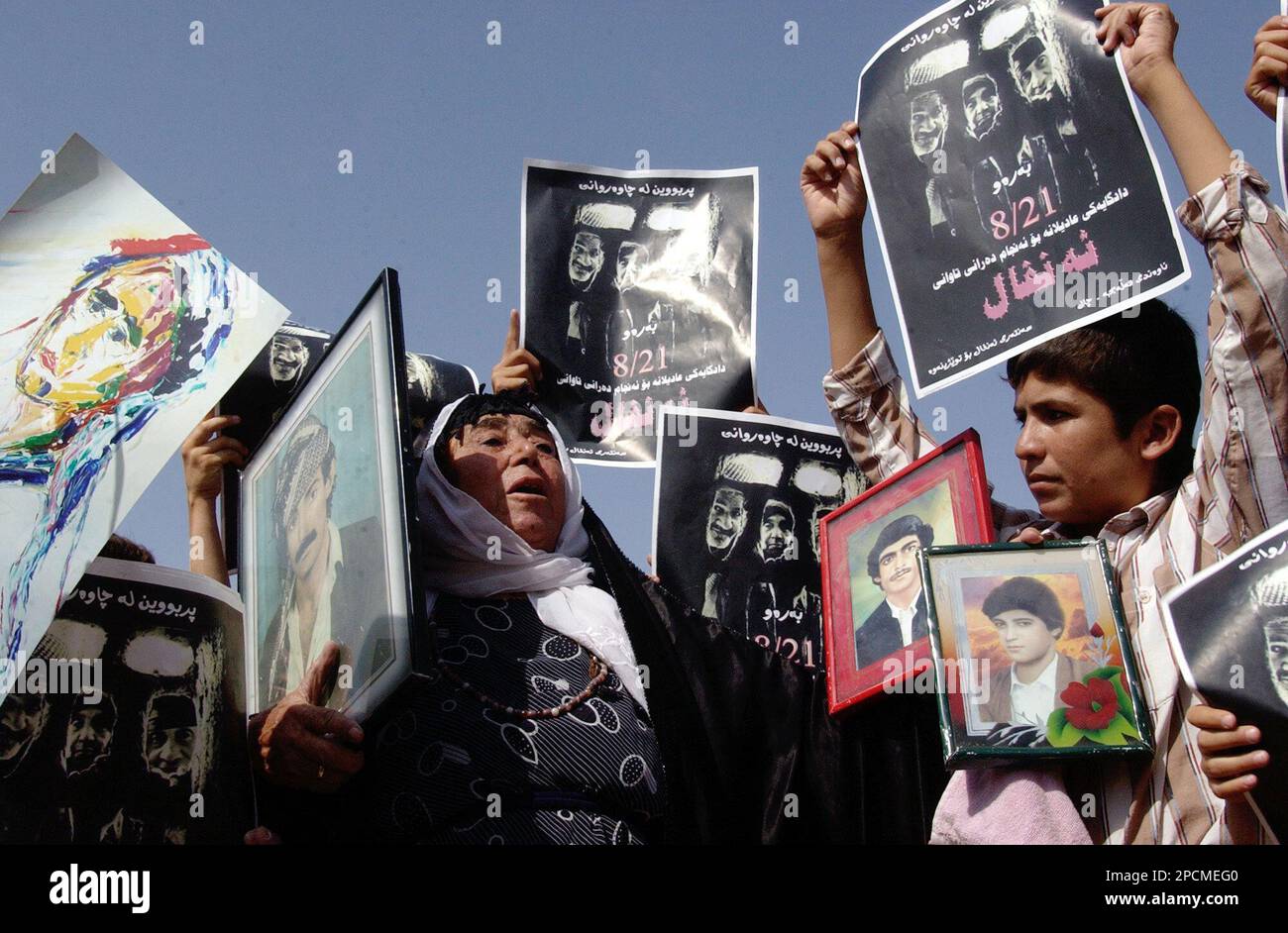 Iraqi Kurd survivors and relatives of victims of the Anfal campaign ...