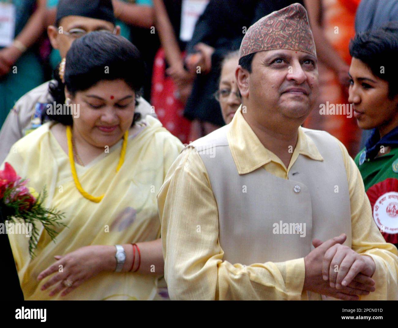 Nepal's King Gyanendra, right, and Queen Komal, left, look on during ...
