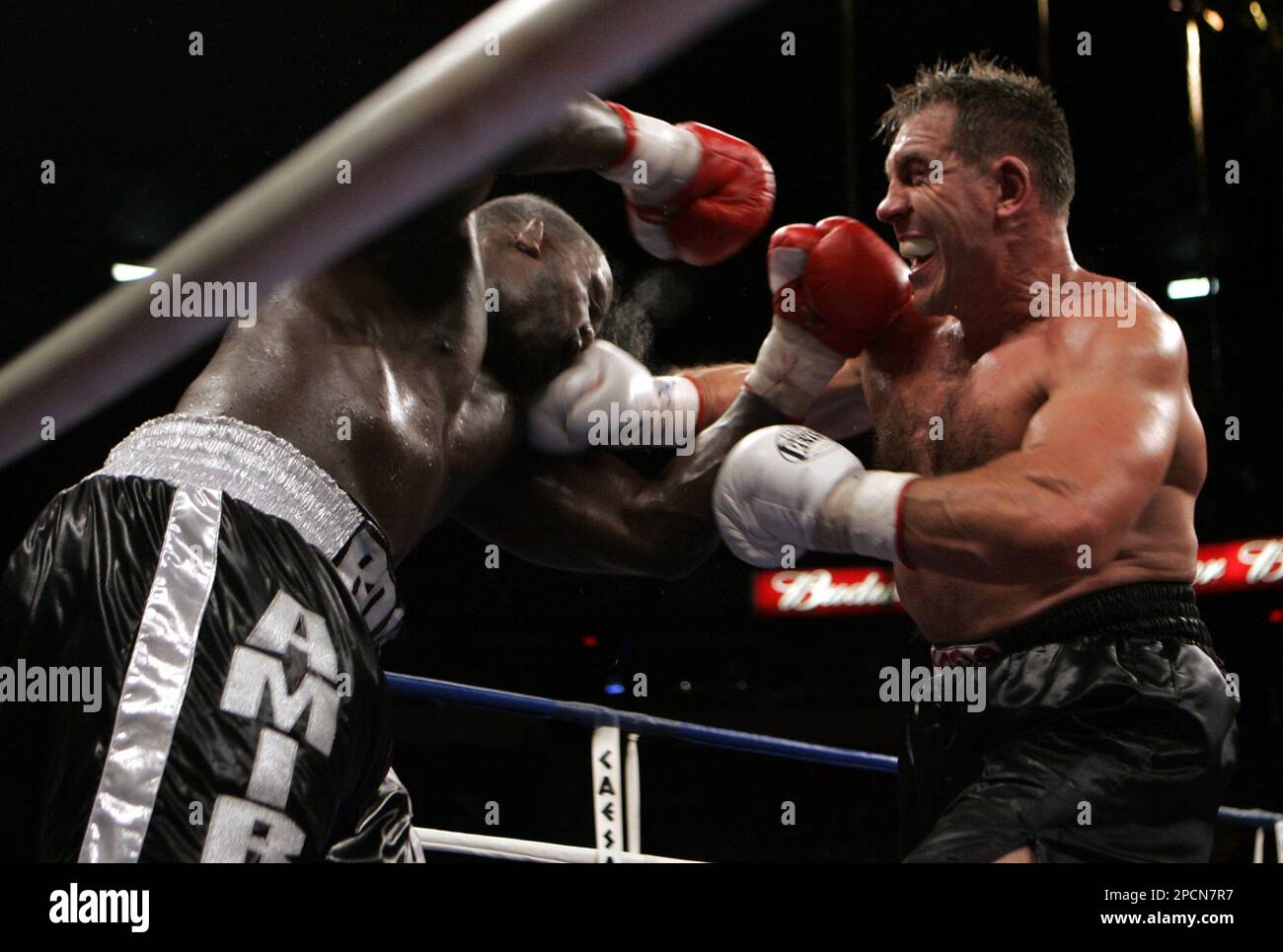 Oleg Maskaev, right, of Karaganda, Kazakhstan, connects to the face of ...