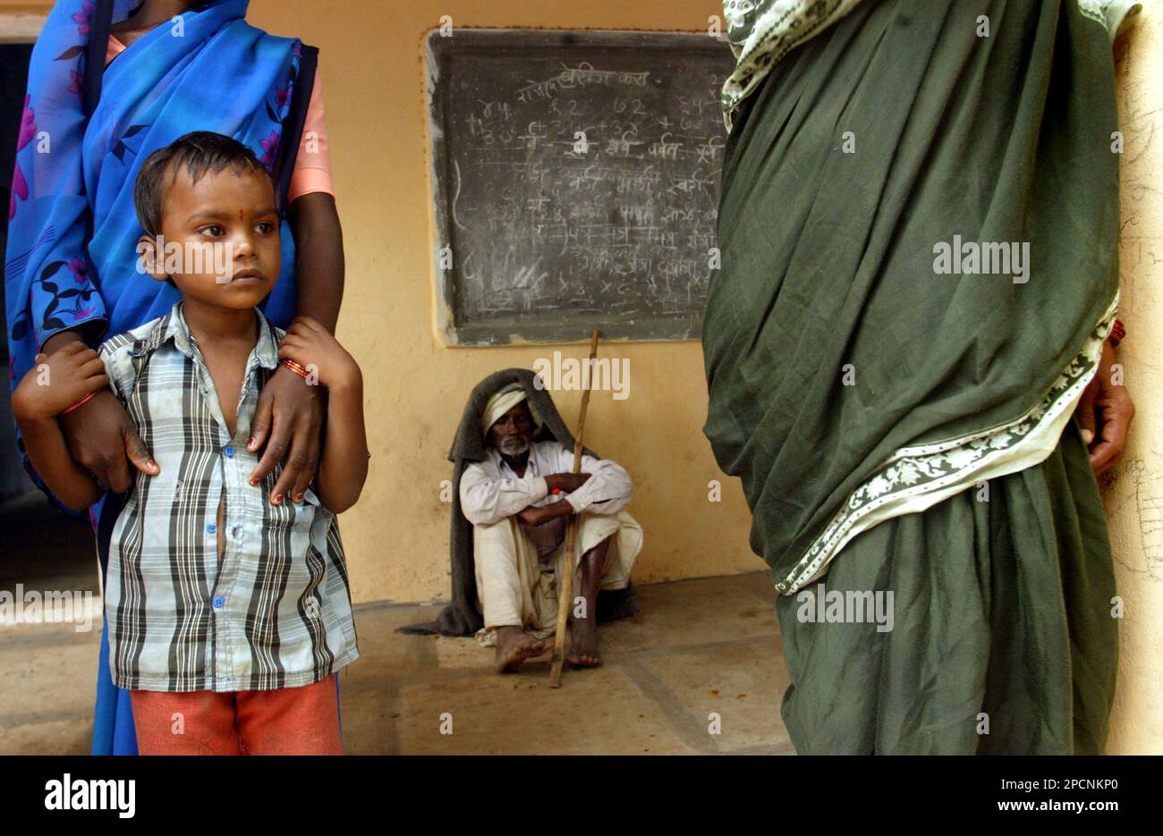 People from Digras and Cholakha villages, which were affected by floods ...