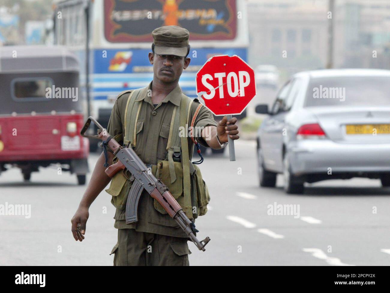 A Sri Lankan government soldier mans a checkpoint in Colombo, Sri Lanka, in this Wednesday, May ...