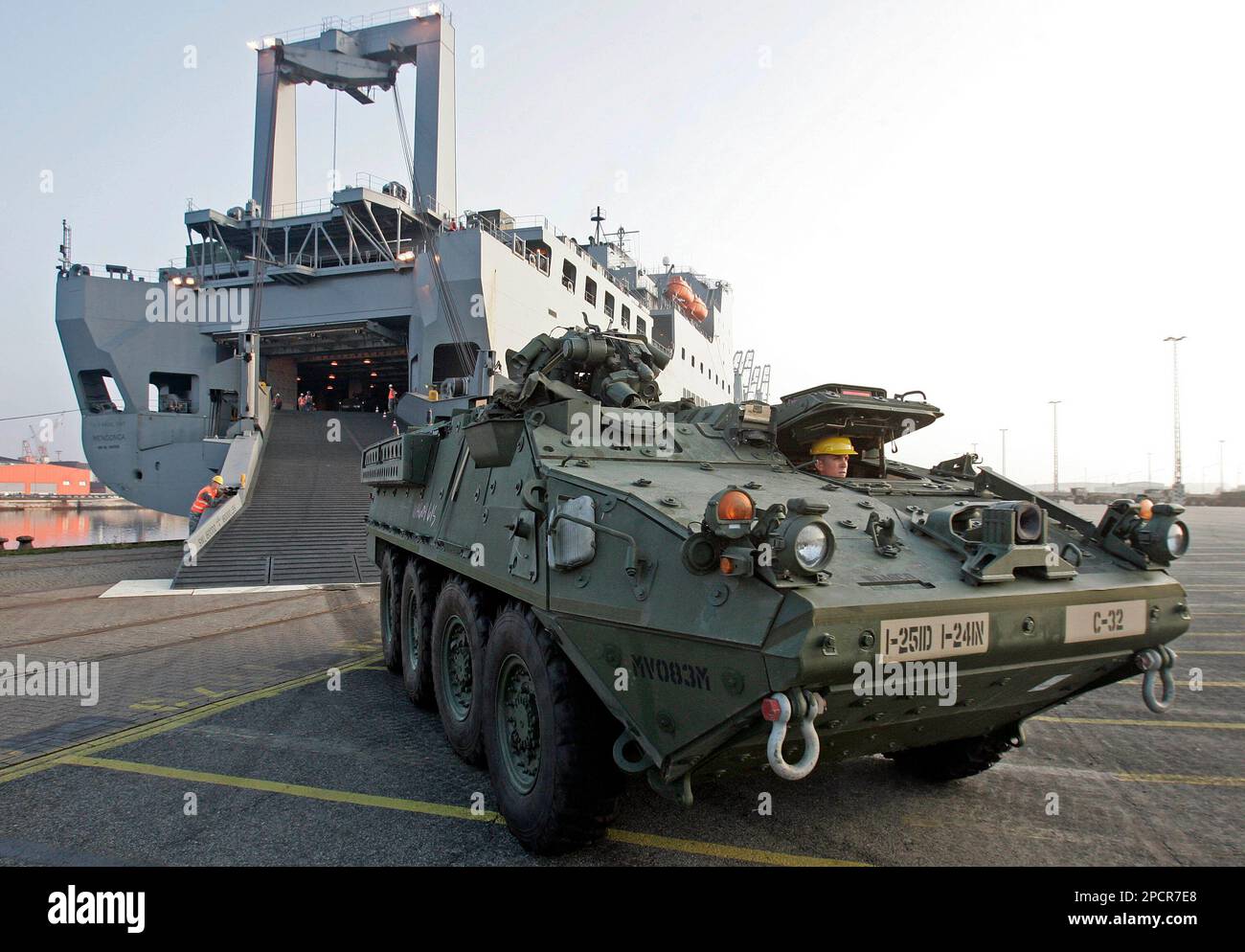 The first 120 of a total of 309 "Strykers" roll off the U.S. Navy cargo ...