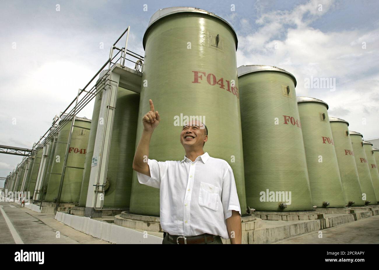 Eddy Lee, chairman of Chinese sauce giant Lee Kum Kee, gestures in ...