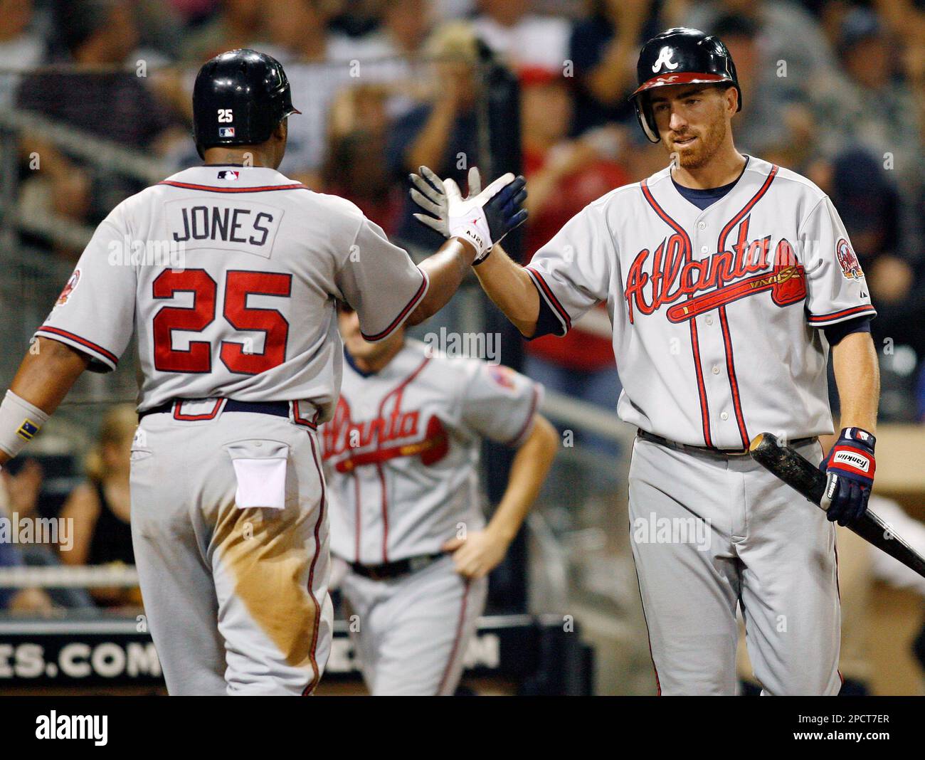 Atlanta Braves' Andruw Jones, left, is congratulated by teammate Adam ...