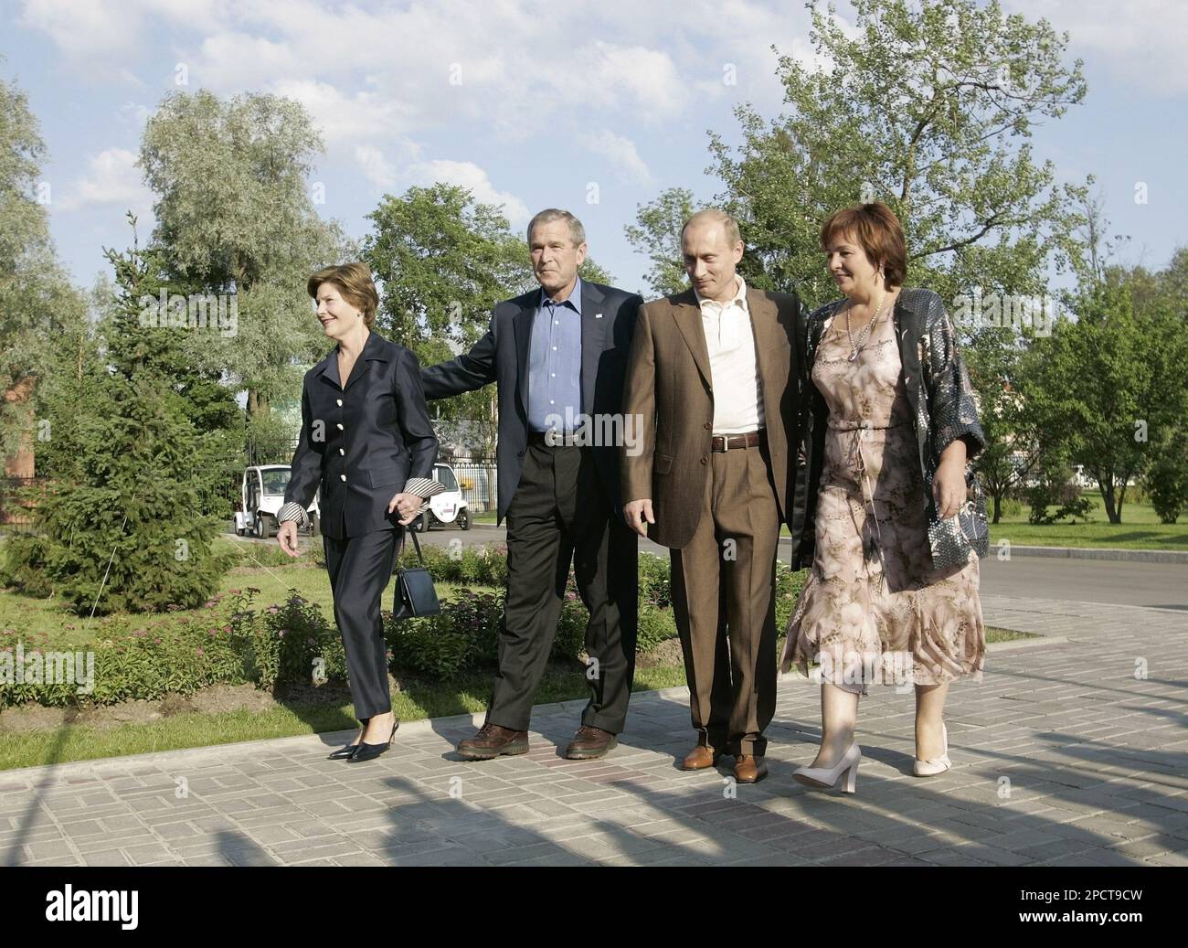 Walking together to have dinner are from left to right, first lady ...