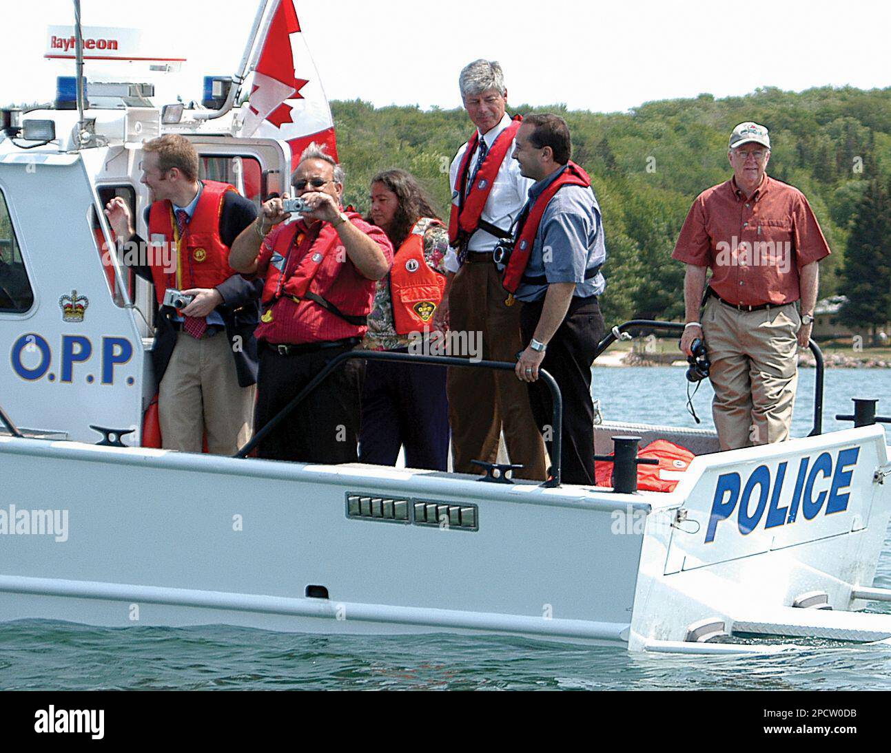 U.S. Congressman Bart Stupak, center, Sault Tribe board member Cathy ...