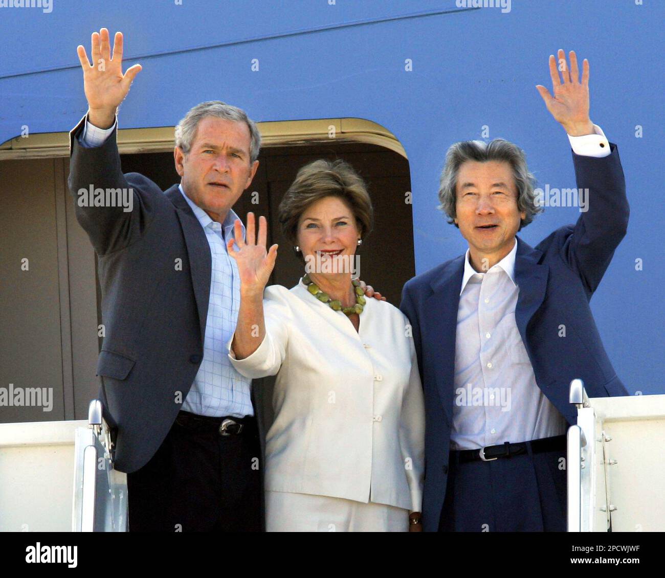 Japan's Prime Minister Junichiro Koizumi, right, waves with President ...