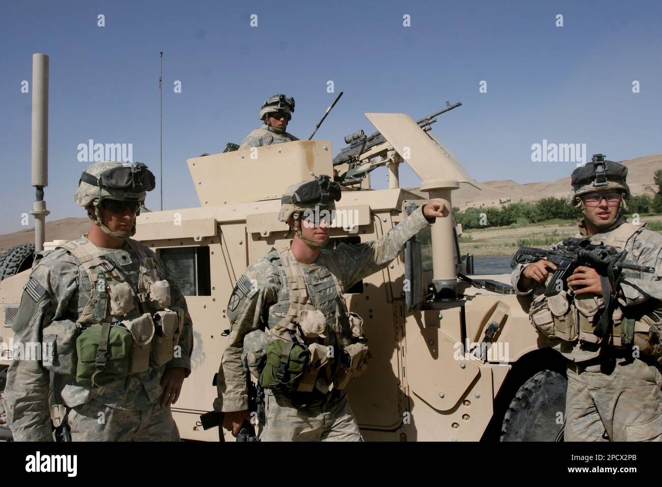 From right, Staff Sgt. Dennis Kirk, Staff Sgt. Justin Larson, Spc. Rene ...