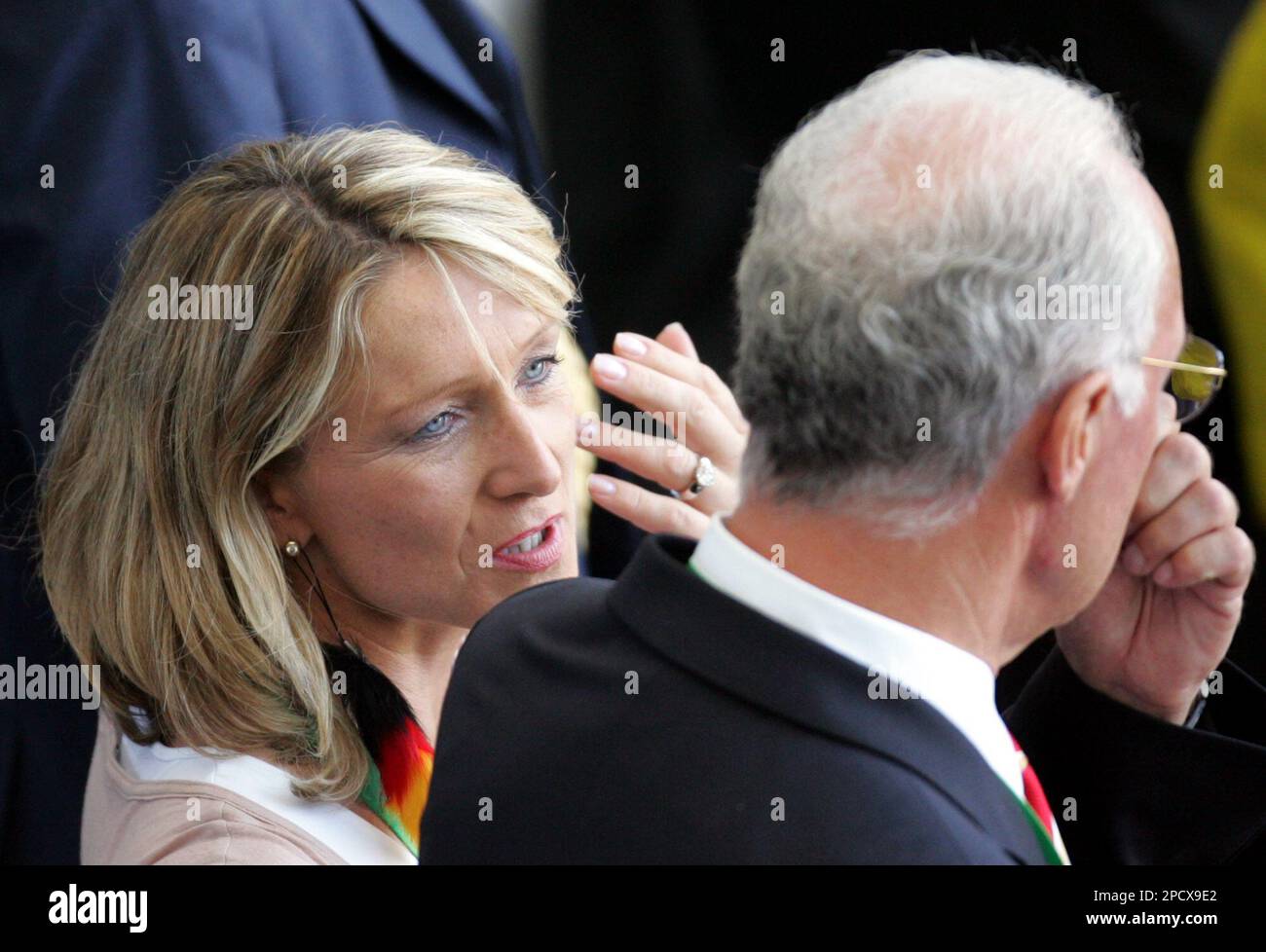 Franz Beckenbauer, right, and his wife Heidi wait for the start of the ...