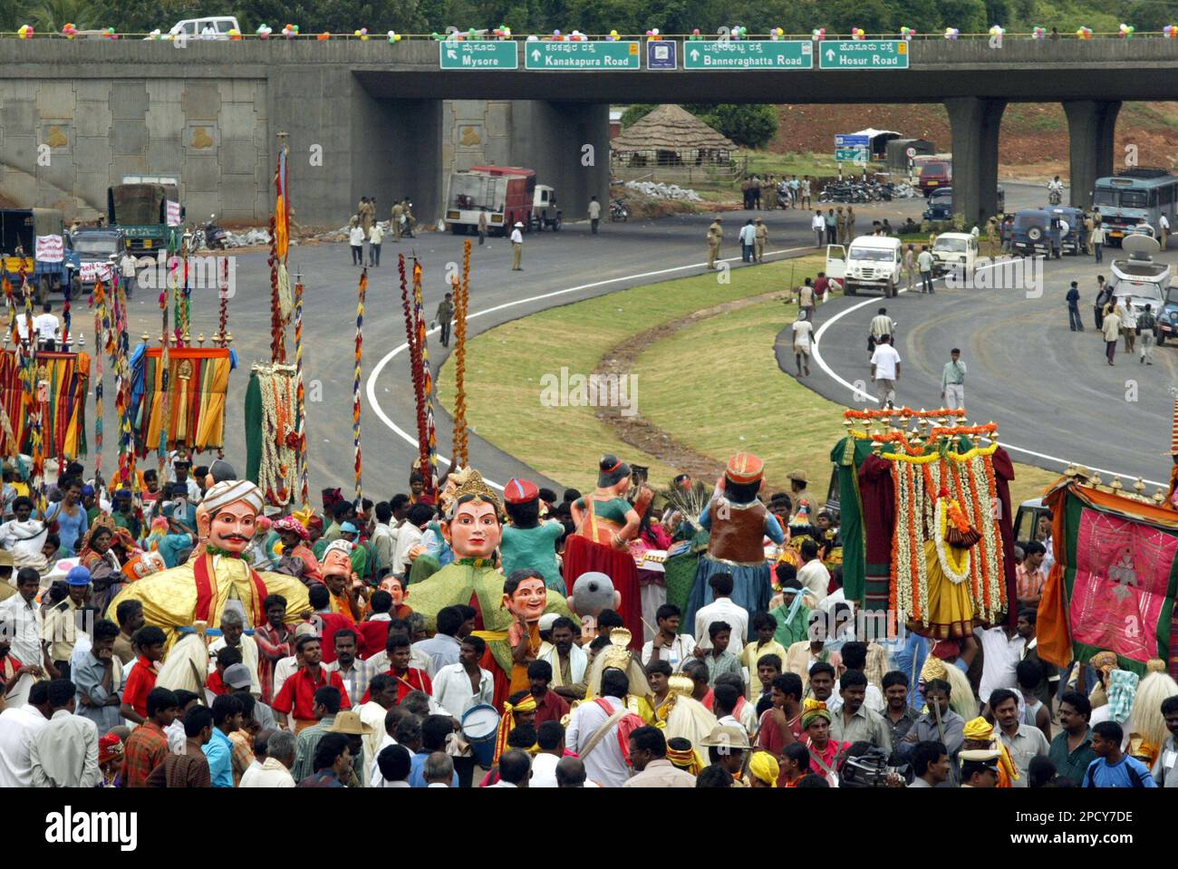 Folk dancers perform at a ceremony to inaugurate a section of the ...