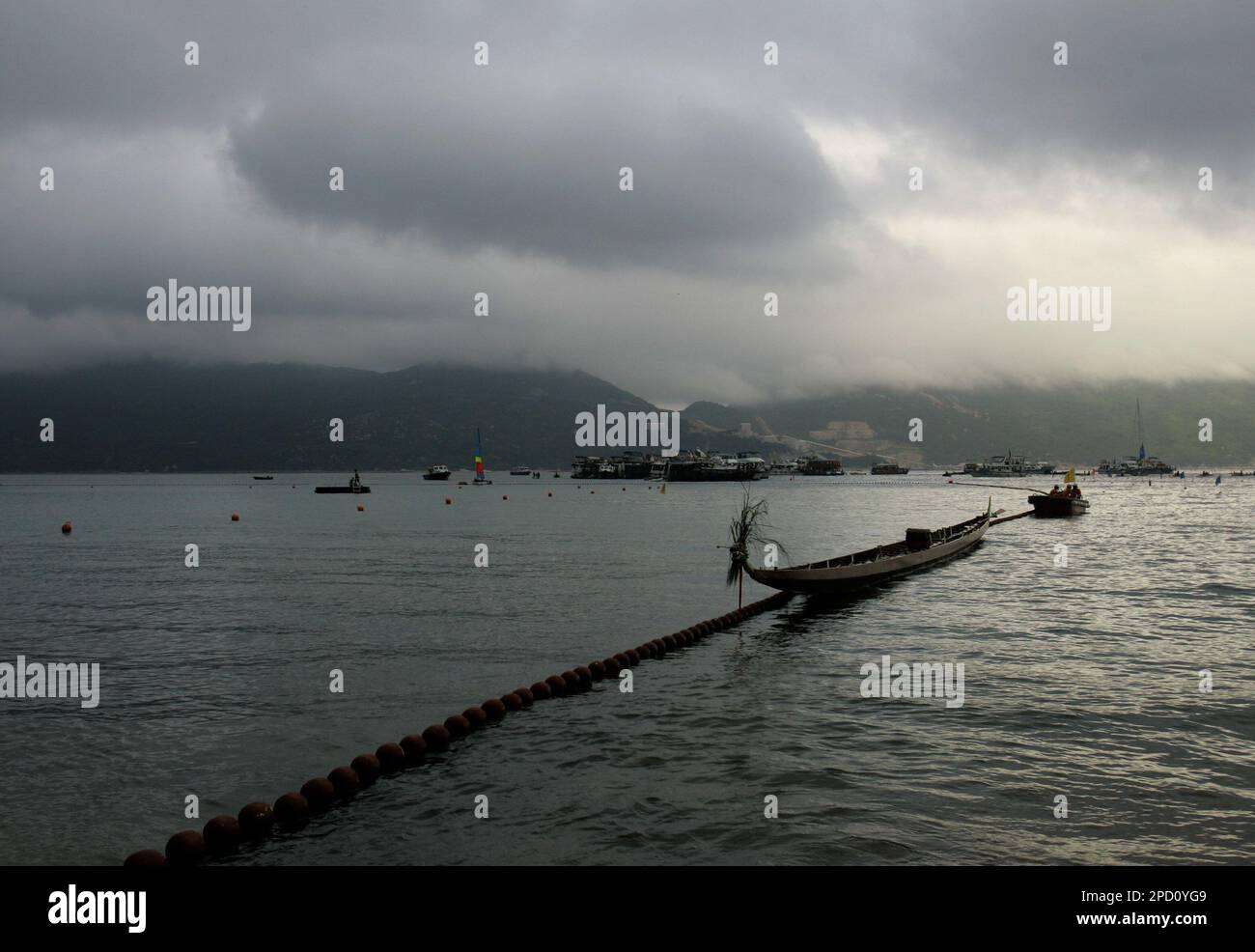 A dragon boat docks at a beach after the racing in Hong Kong's Stanley ...