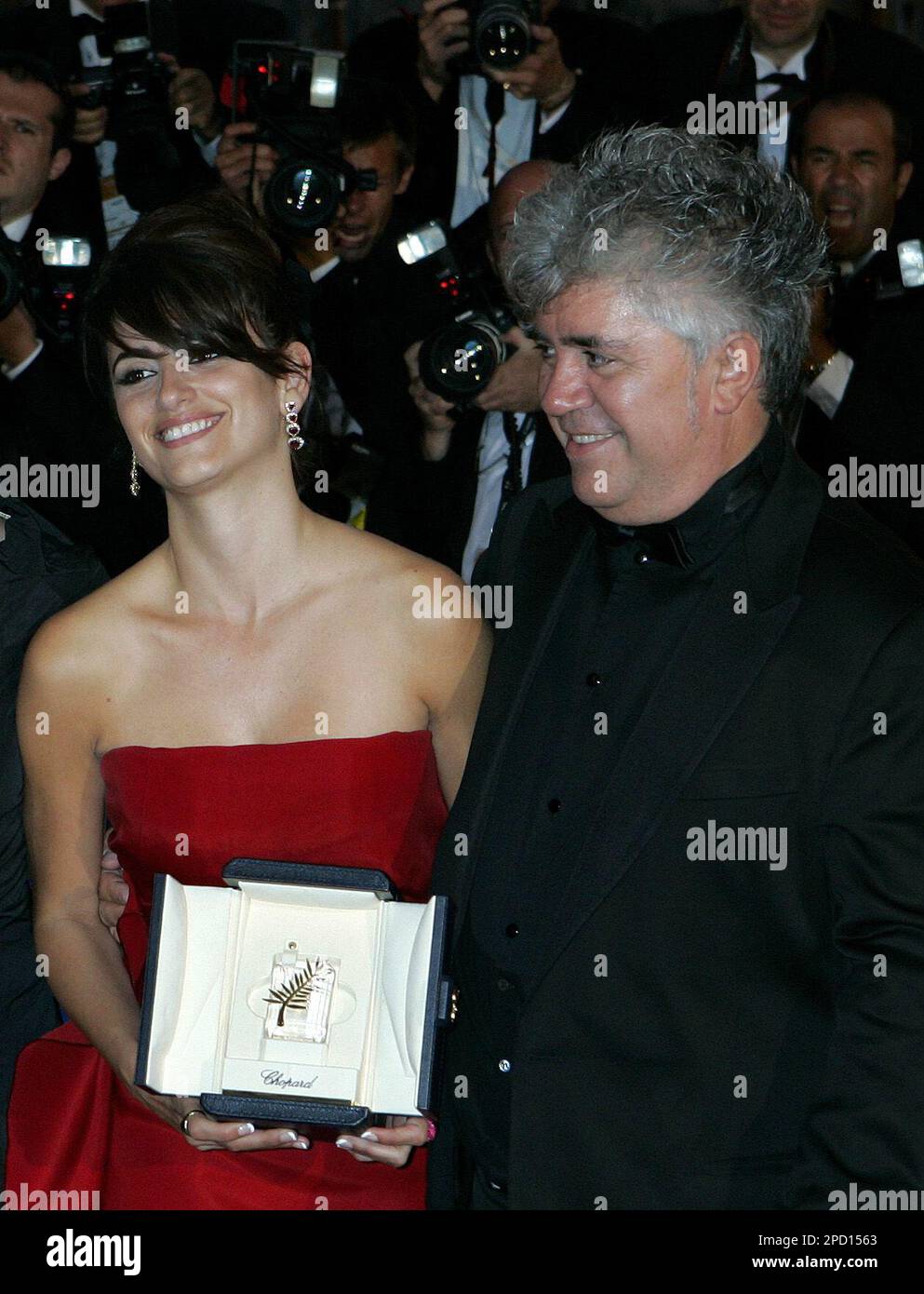 Director Pedro Almodovar, right, winner of the best screenplay award ...
