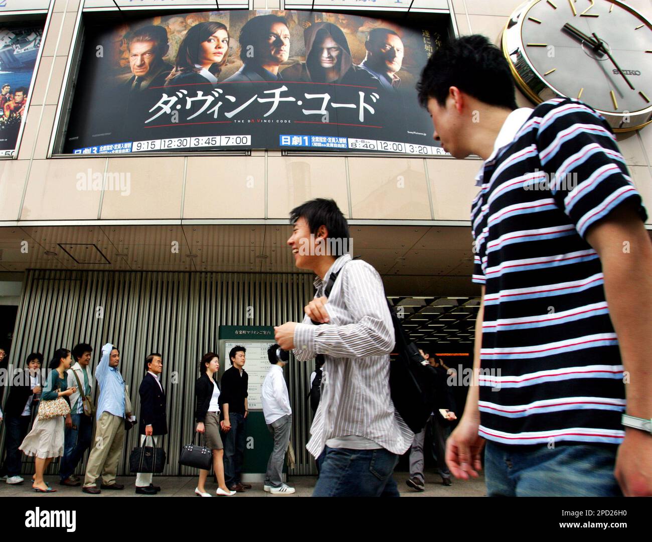 Japanese movie-goers queue at a theater Saturday, May 20, 2006 in Tokyo ...