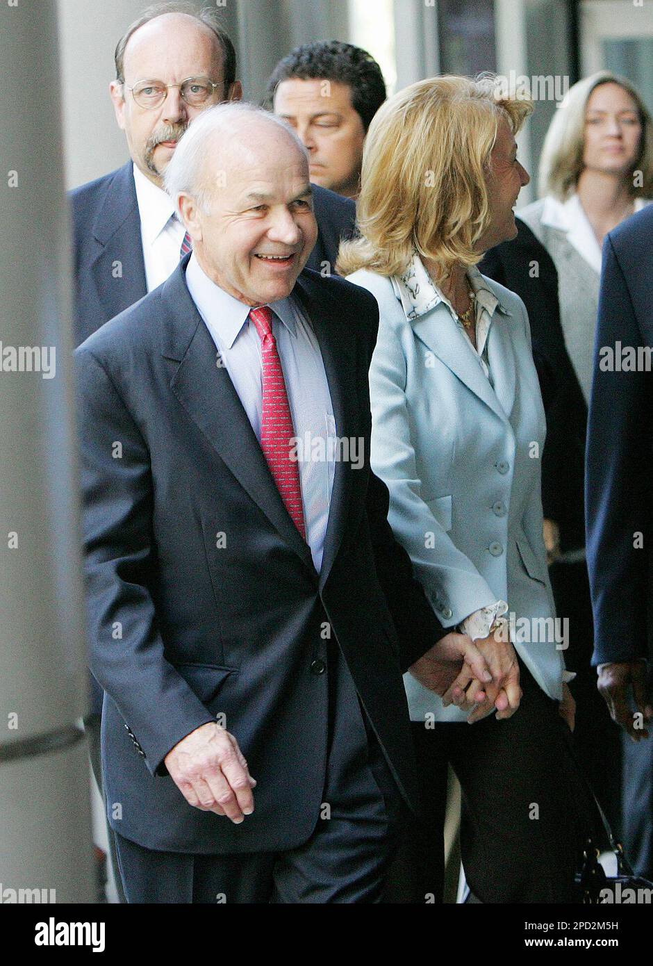 Enron founder Kenneth Lay, left, and his wife, Linda, leave the federal ...