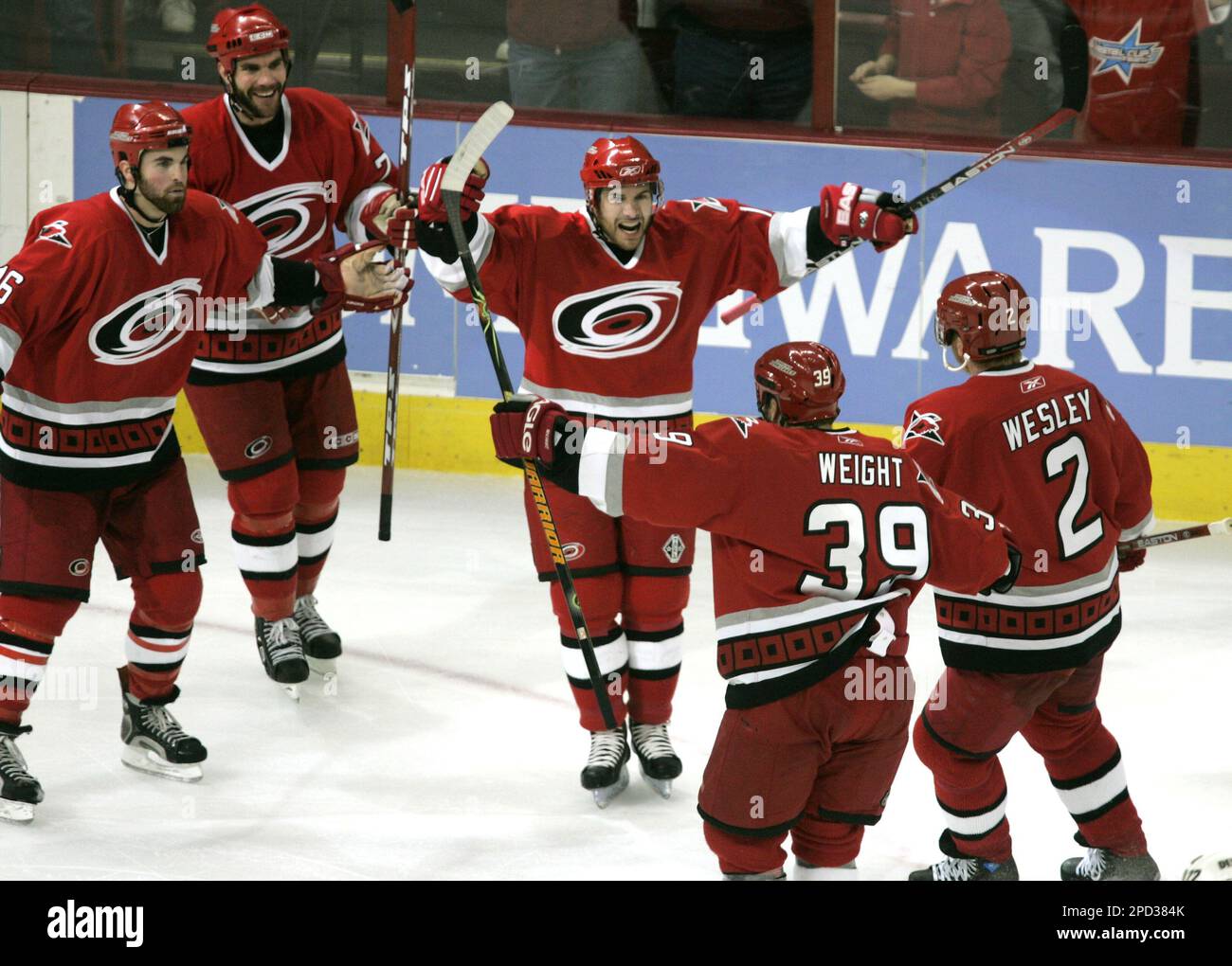 Carolina Hurricanes' Ray Whitney, center, celebrates his goal against ...