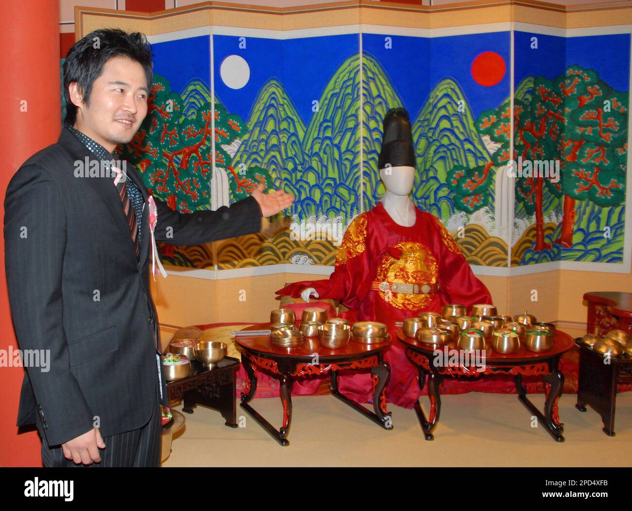 South Korean actor Lim Ho introduces a reproduced set at the opening of ...