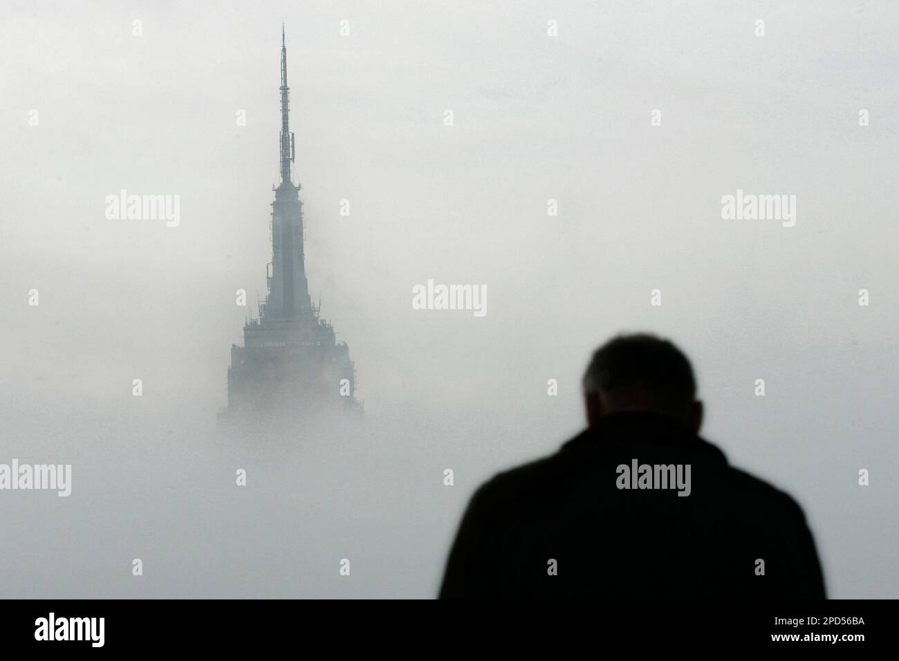 **FILE** Tom Seitz of Cleveland, Ohio, looks at the Empire State ...