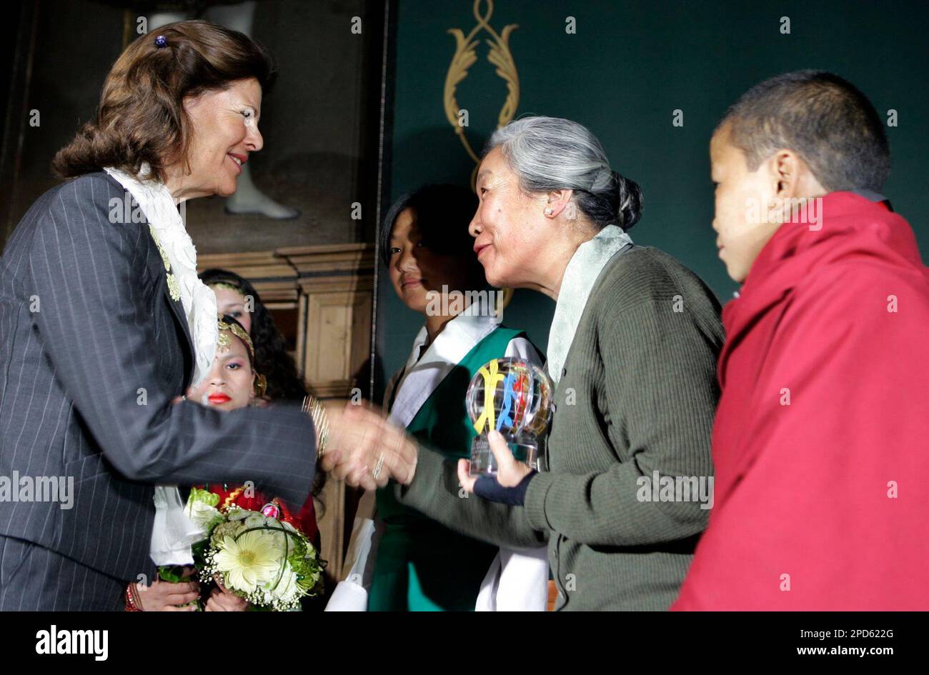 Jetsun Pema from Tibet, the sister ofthe Dalai Lama, second from right ...