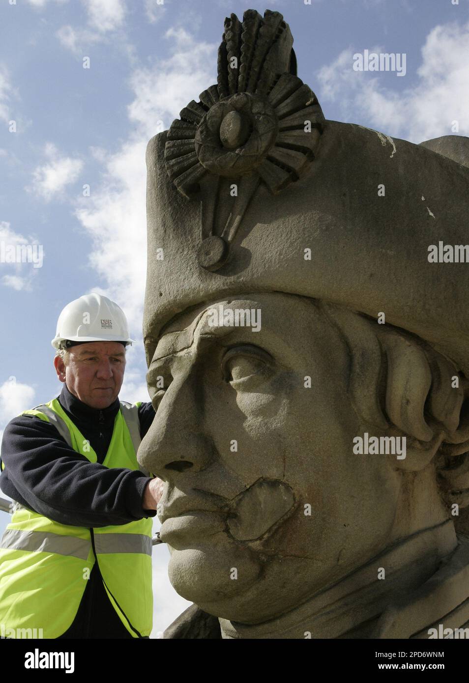 Cleaning supervisor Bob Egan inspects the head of Admiral Lord Nelson ...