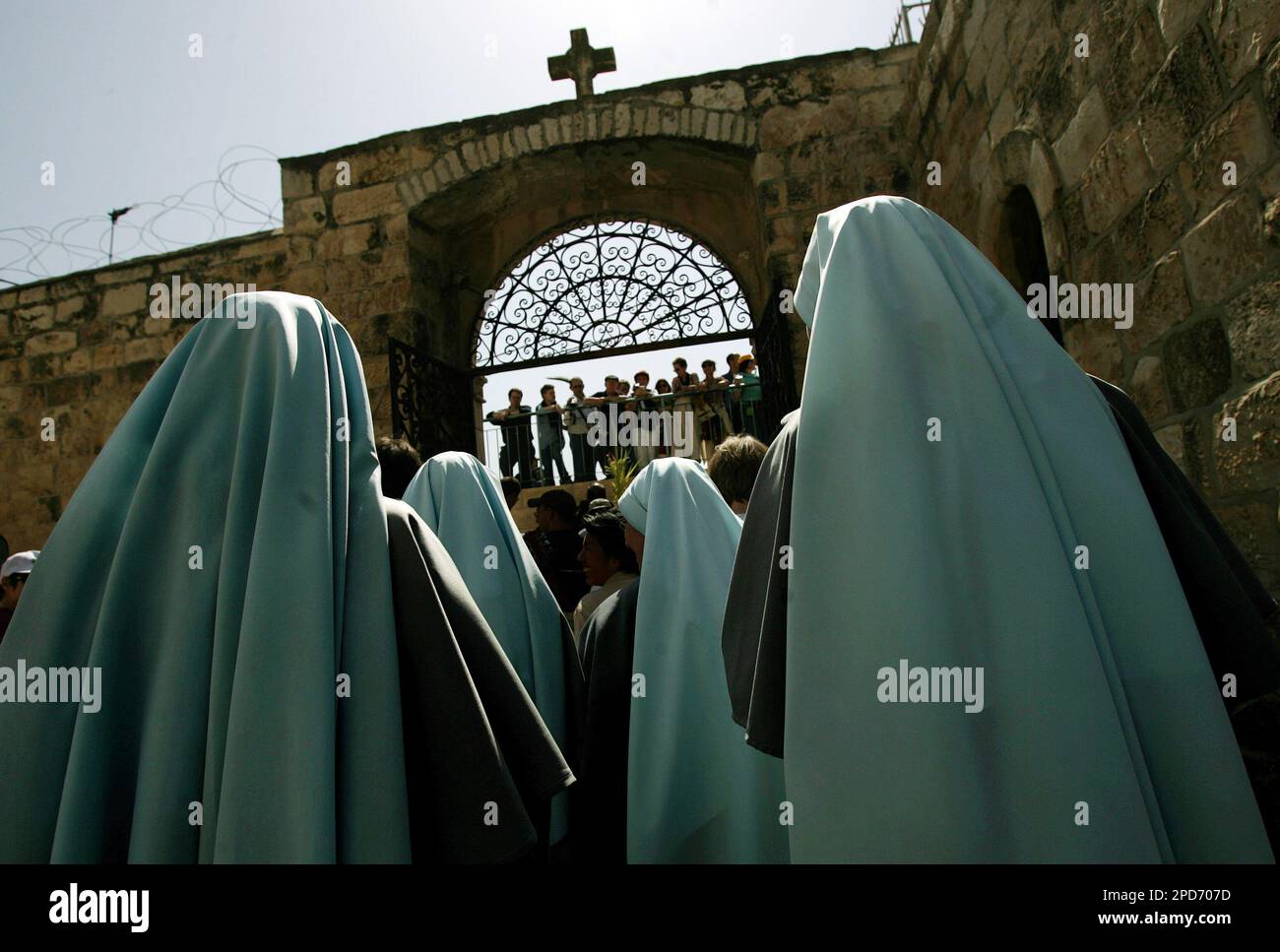 Christian worshipers and Catholic nuns participate in the traditional ...