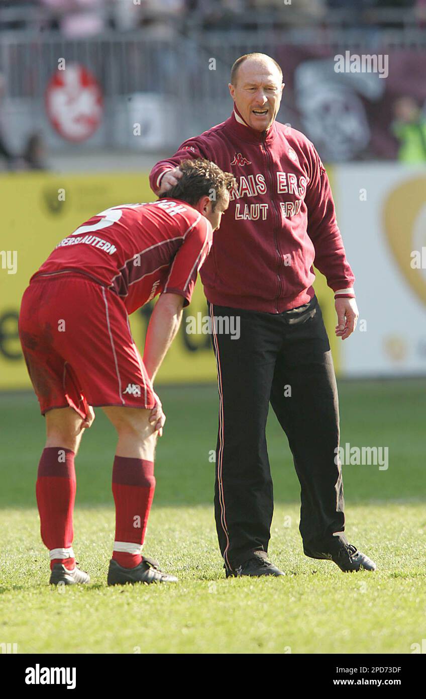 Kaiserslauterns soccer player Ingo Hertsch, left, and headcoach ...