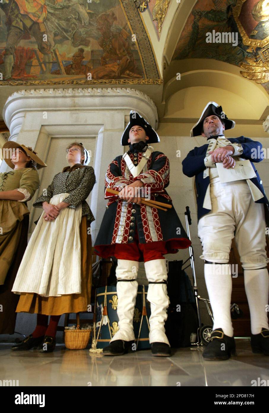 Reenactors Anne McCarty, from left to right, Lisa Lutts, dressed as ...