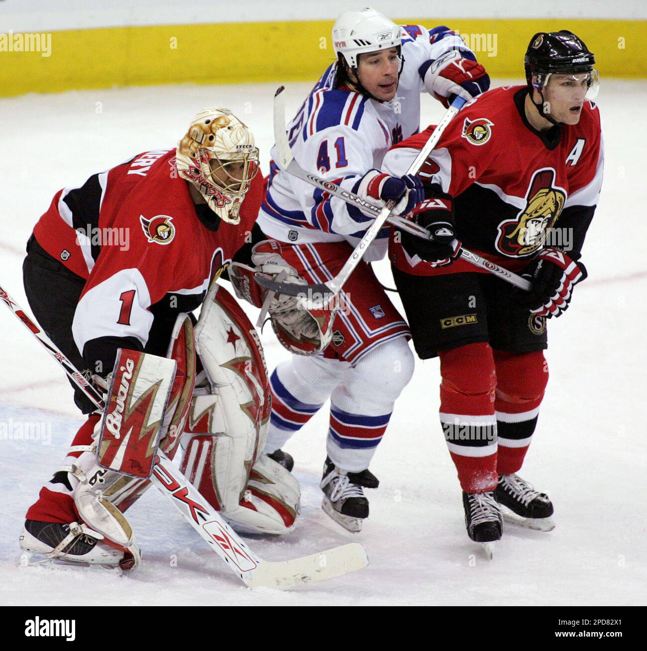 Ottawa Senators goaltender Ray Emery, left, and Brian Pothier, right ...