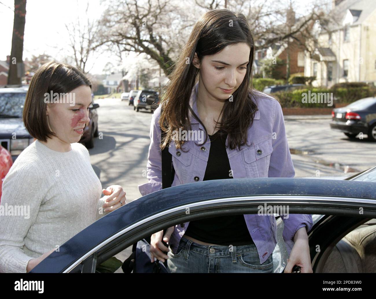 Katie Carroll, right, the twin sister of journalist Jill Carroll, is ...