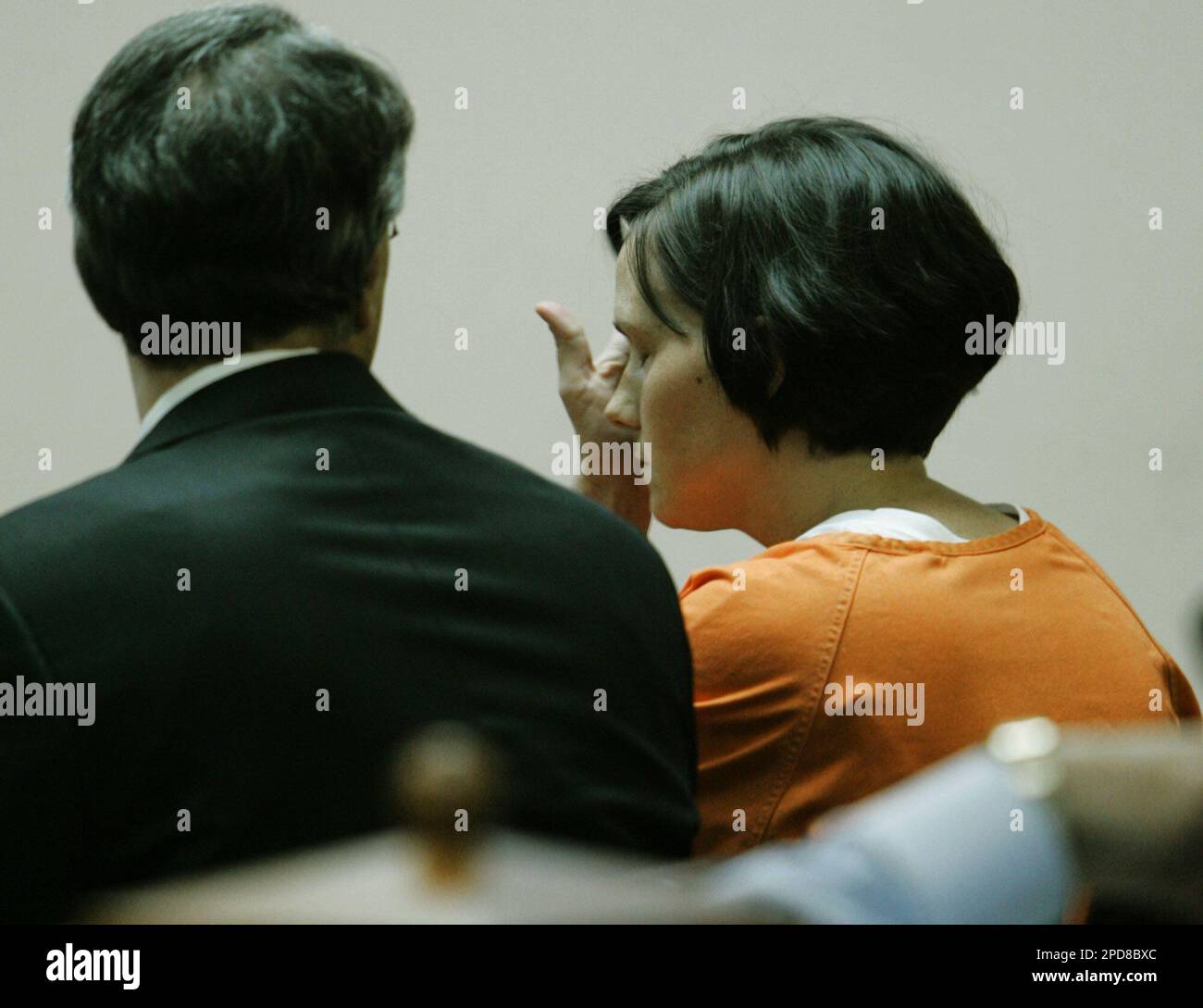 Mary Winkler, right, wipes her face during her arraignment in Selmer ...