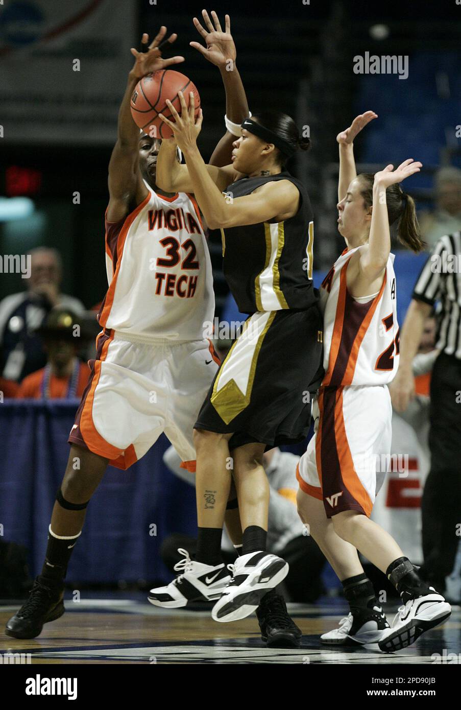 Virginia Tech's Kerri Gardin, left, and Carrie Mason, right, pressure ...