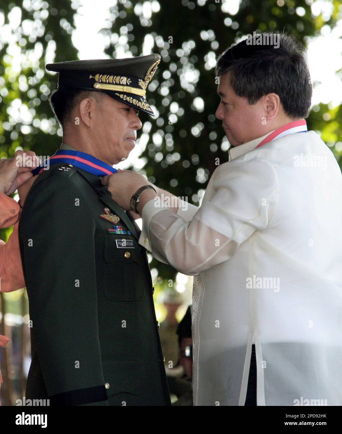 Controversial Philippine Army Maj.Gen. Jovito Palparan, left, receives ...