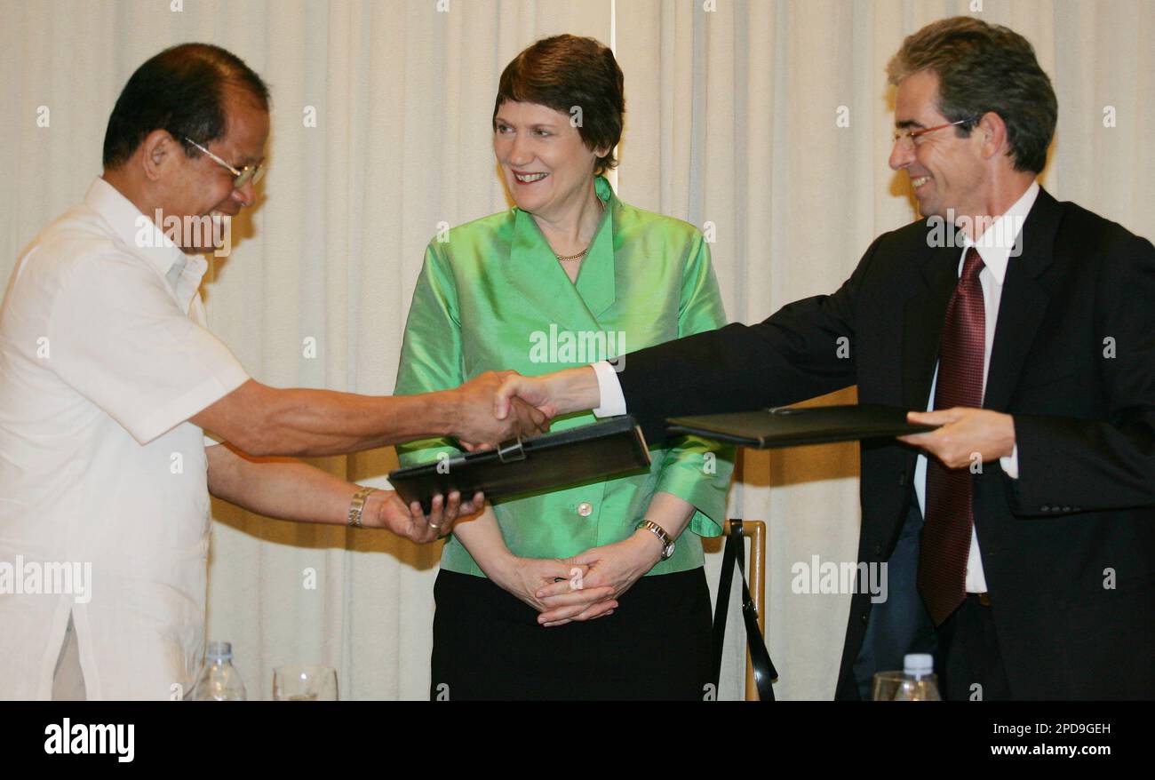 Philippine Agriculture Secretary Domingo Panganiban, left, and New ...