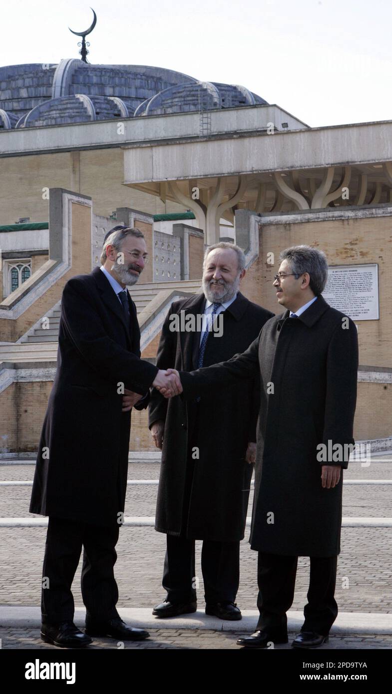 Rome's chief Rabbi Riccardo Di Segni, left, shakes hands with Abdellah ...