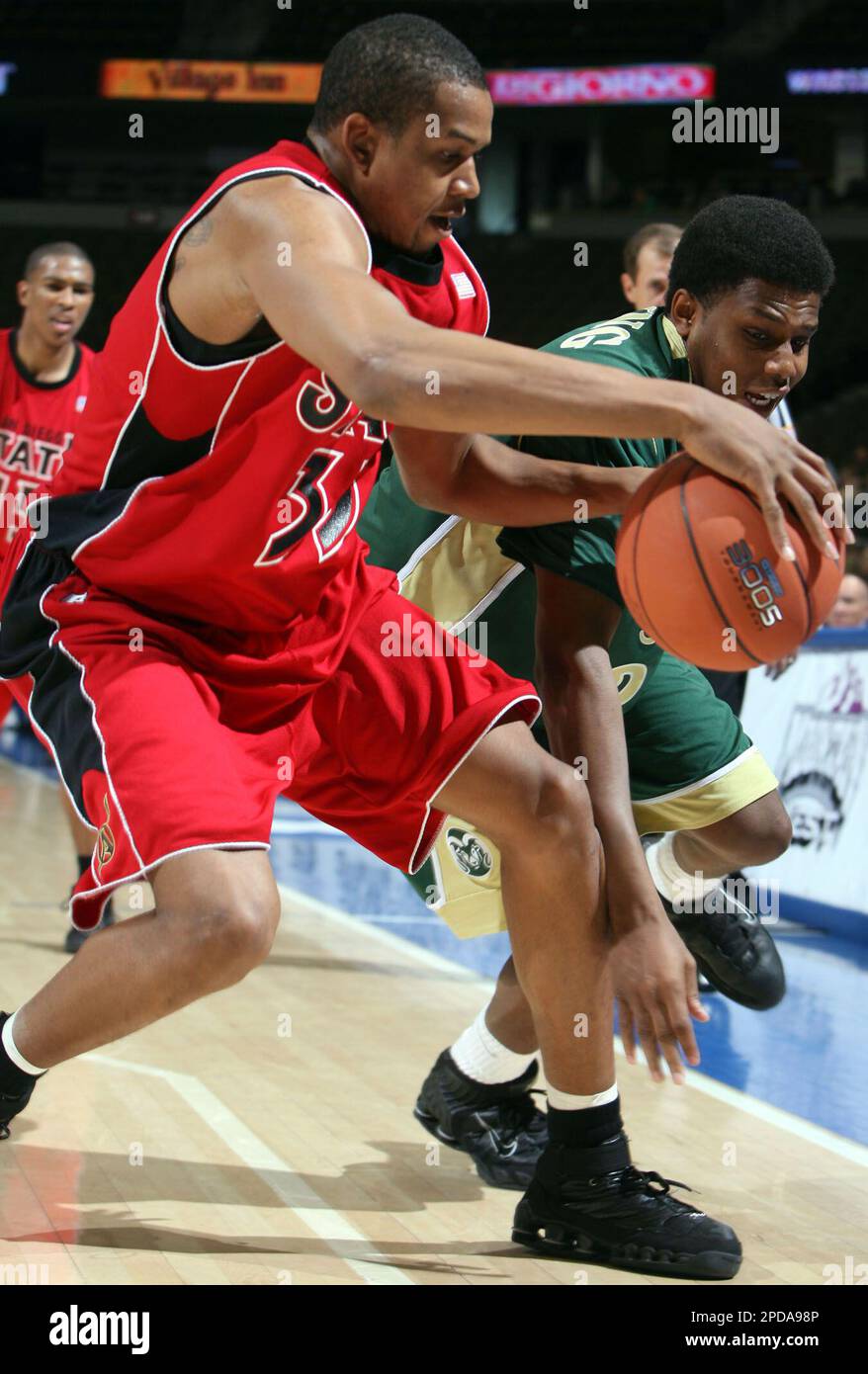 San Diego State forward Kyle Spain, front, struggles to pick up a loose ...