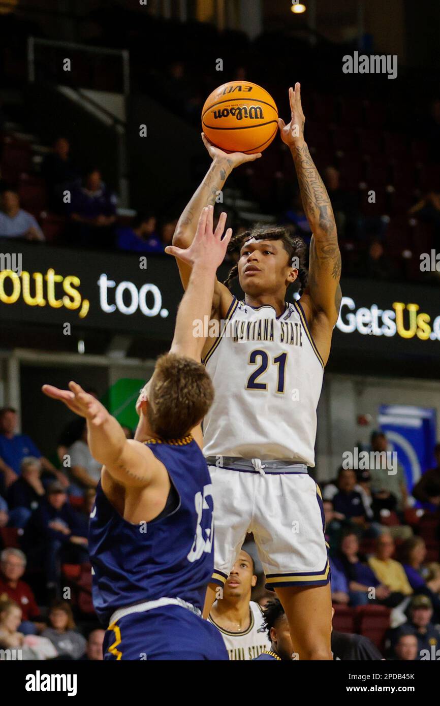 Montana State guard RaeQuan Battle (21 puts up a shot over Northern ...
