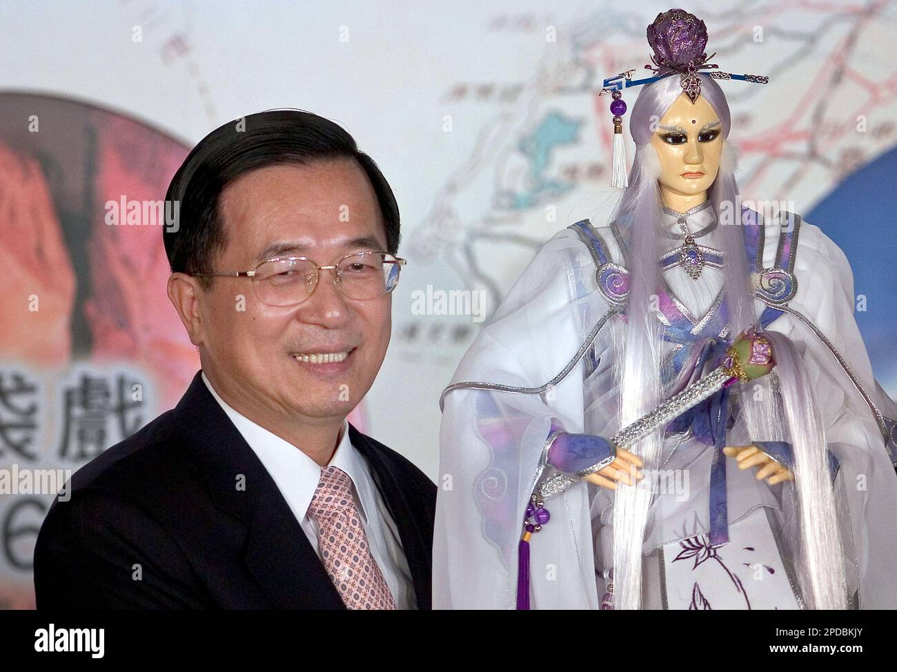 Taiwan's president Chen Shui-bian holds a puppet from the Taiwanese ...