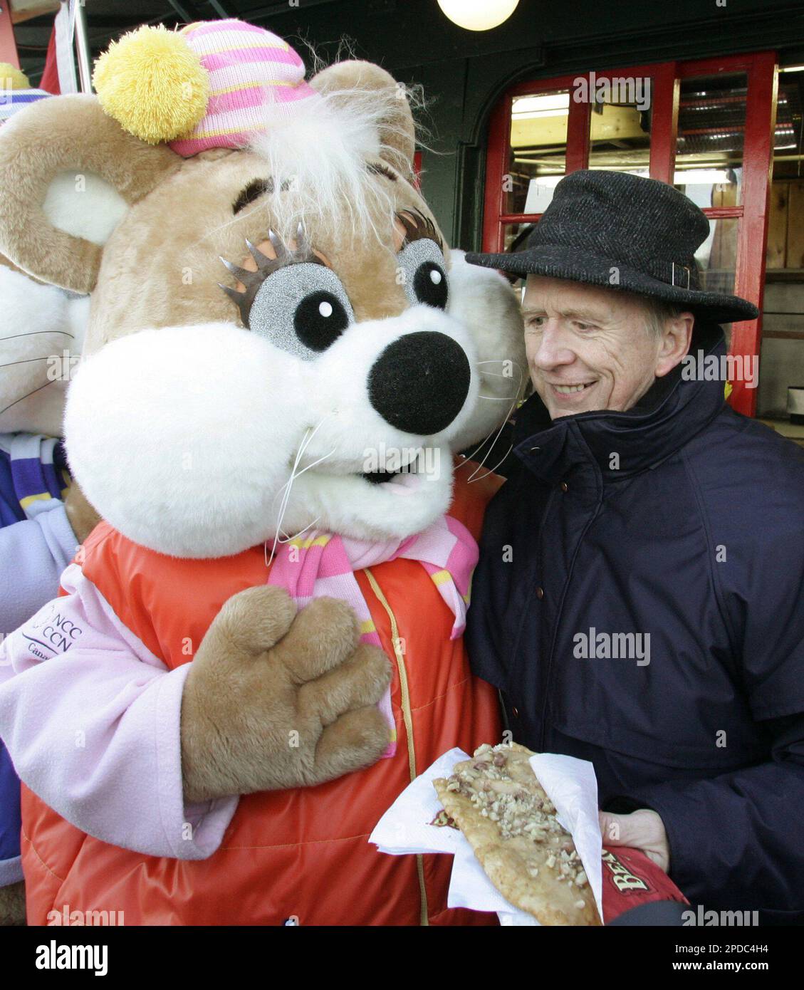 United States Ambassador to Canada David Wilkins gets hugged by Ice Hog ...