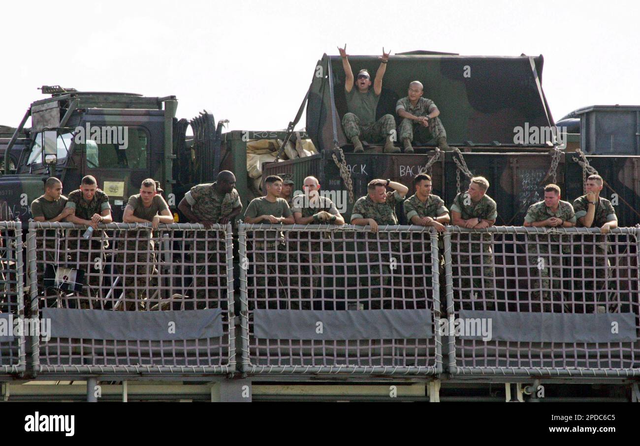U.S. Marines from the U.S. Navy's Forward Deployed Amphibious Ready ...