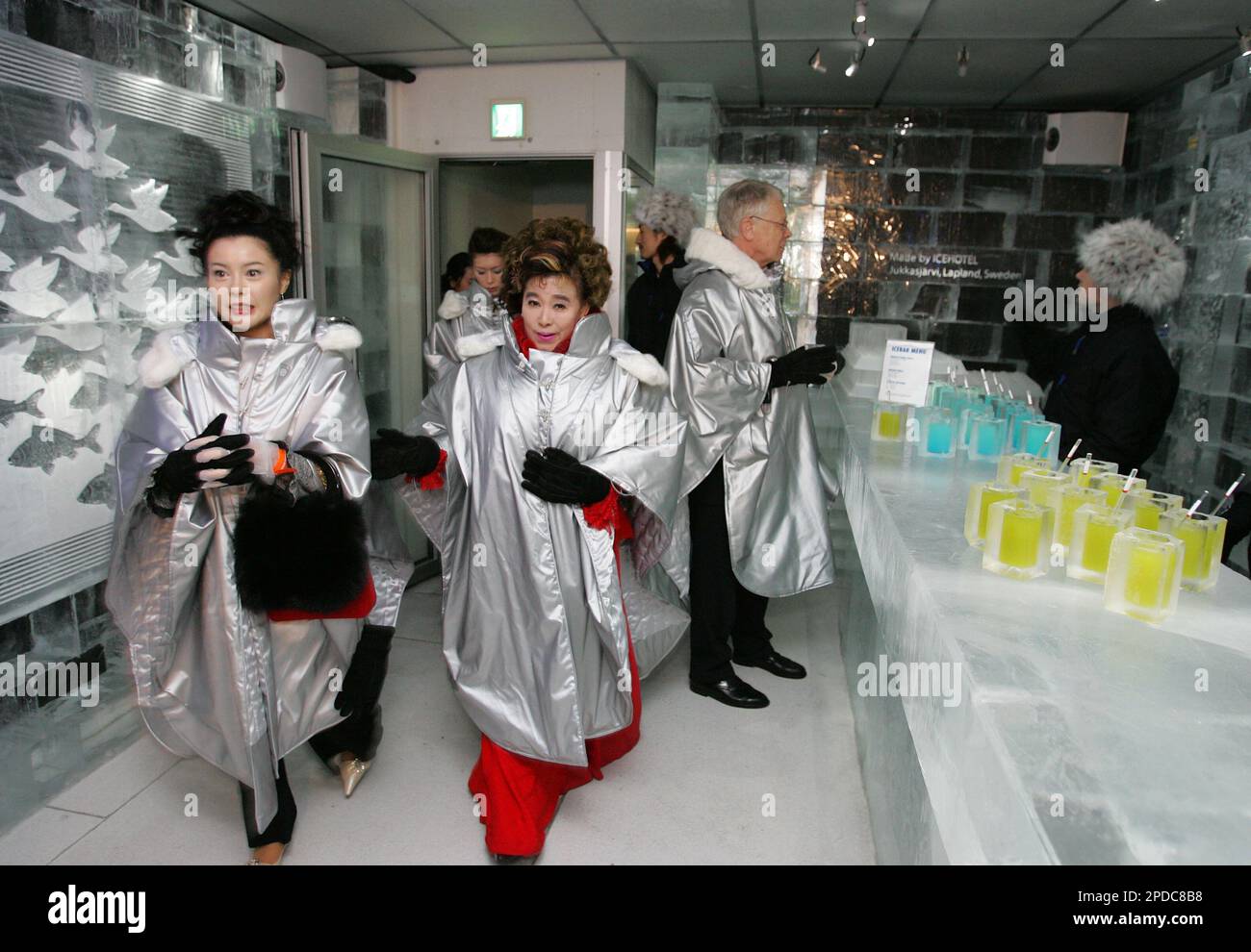 A group of guests walk into a Tokyo's new night spot Absolut Icebar for ...