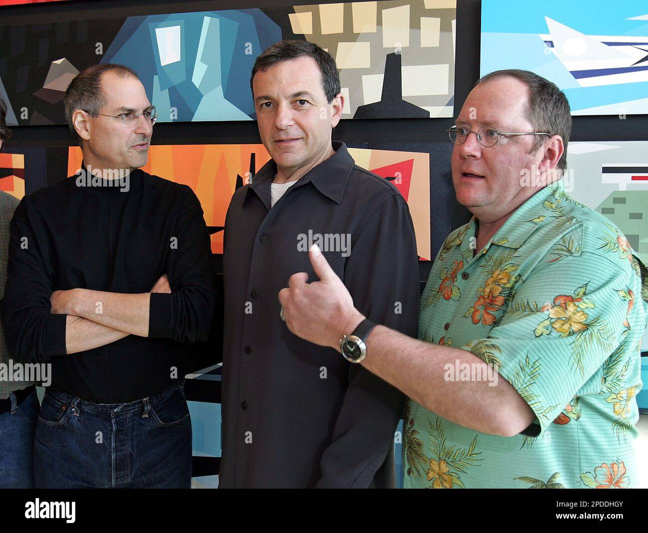 Walt Disney Co. CEO Robert Iger, center, talks with Pixar Animation ...