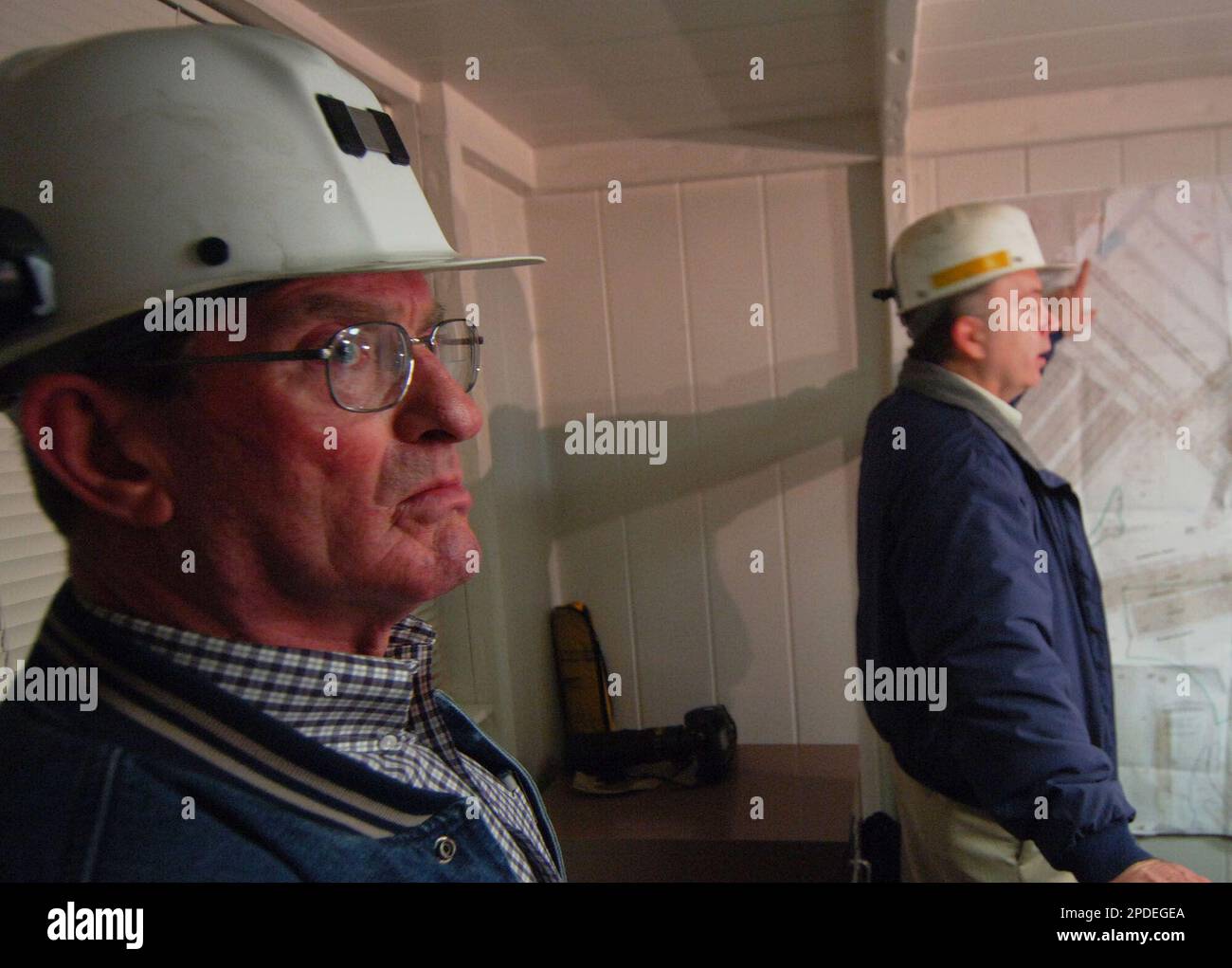 Jesse Cole, left, of the Mine Safety and Health Administration listens ...