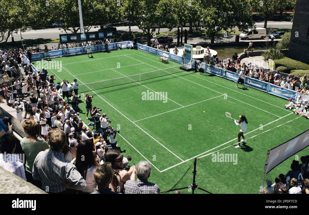 U.S. tennis stars Venus Williams, right, and Andy Roddick play in a ...