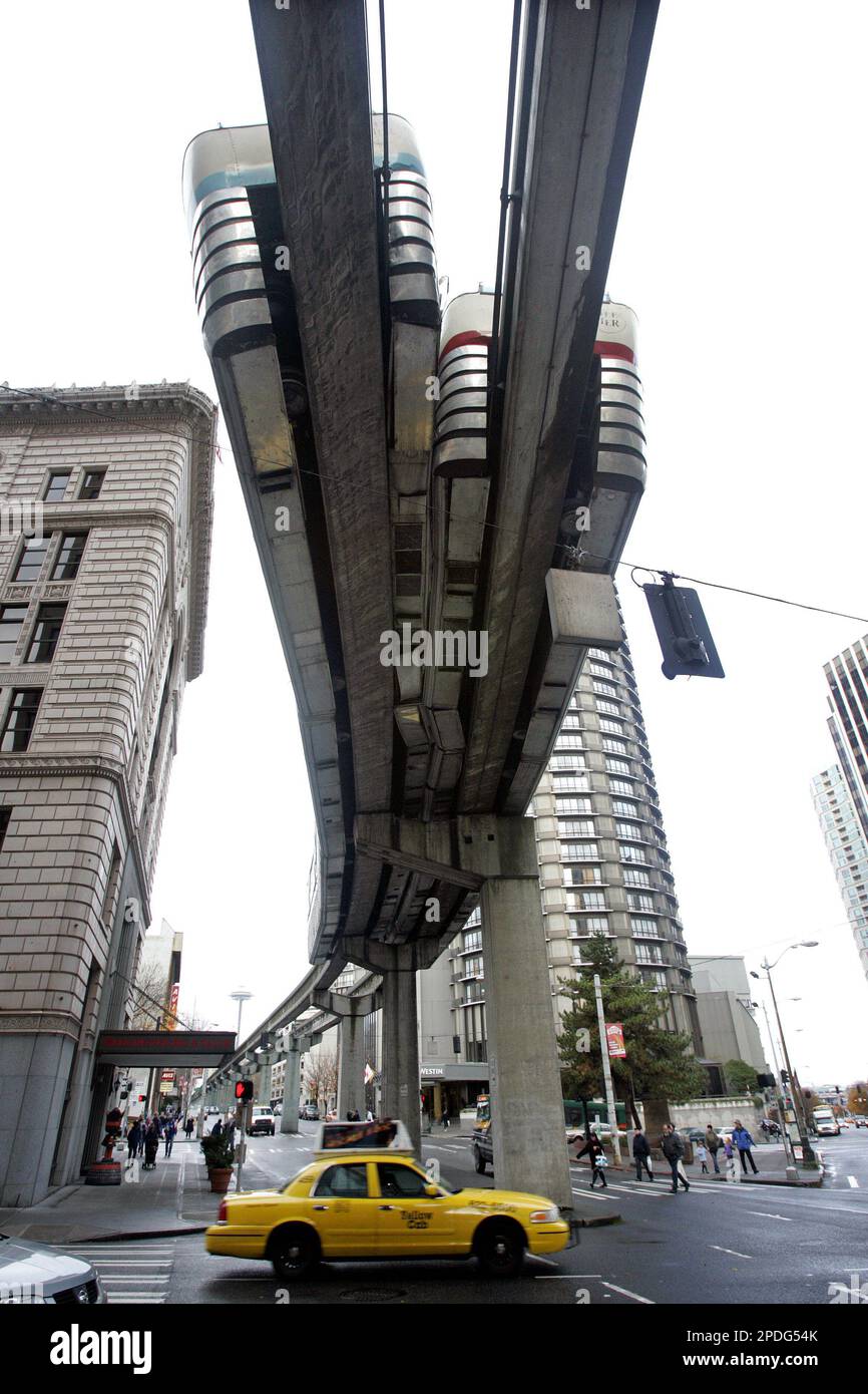 ** ADVANCE FOR MONDAY, DEC. 26, FILE ** The two monorail trains sit on ...