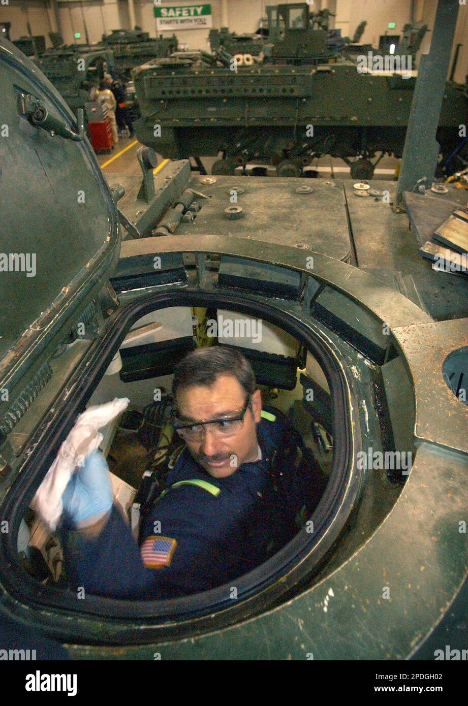 General Dynamics Land Systems, Inc. mechanic Heriberto Melendez cleans ...