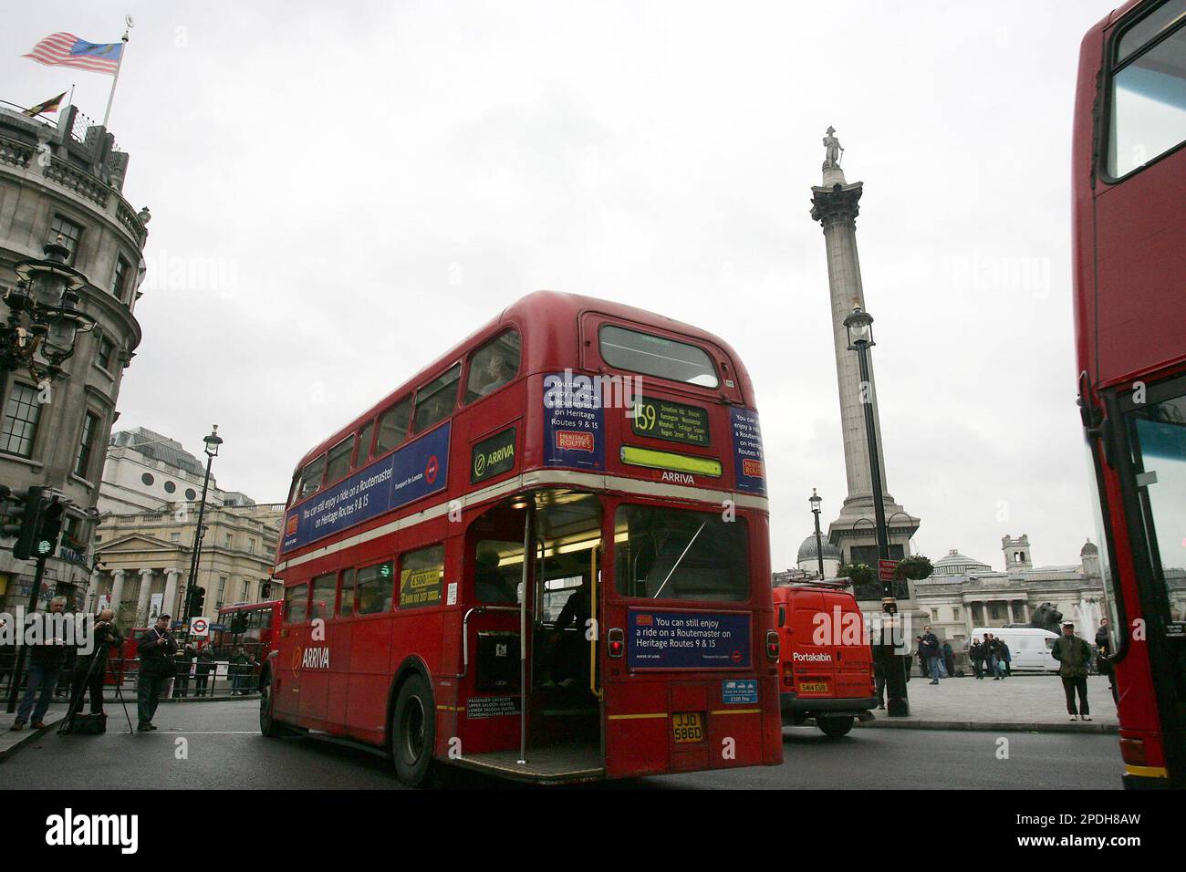 A Routemaster bus passes Trafalgar Square in London Thursday, Dec. 8 ...